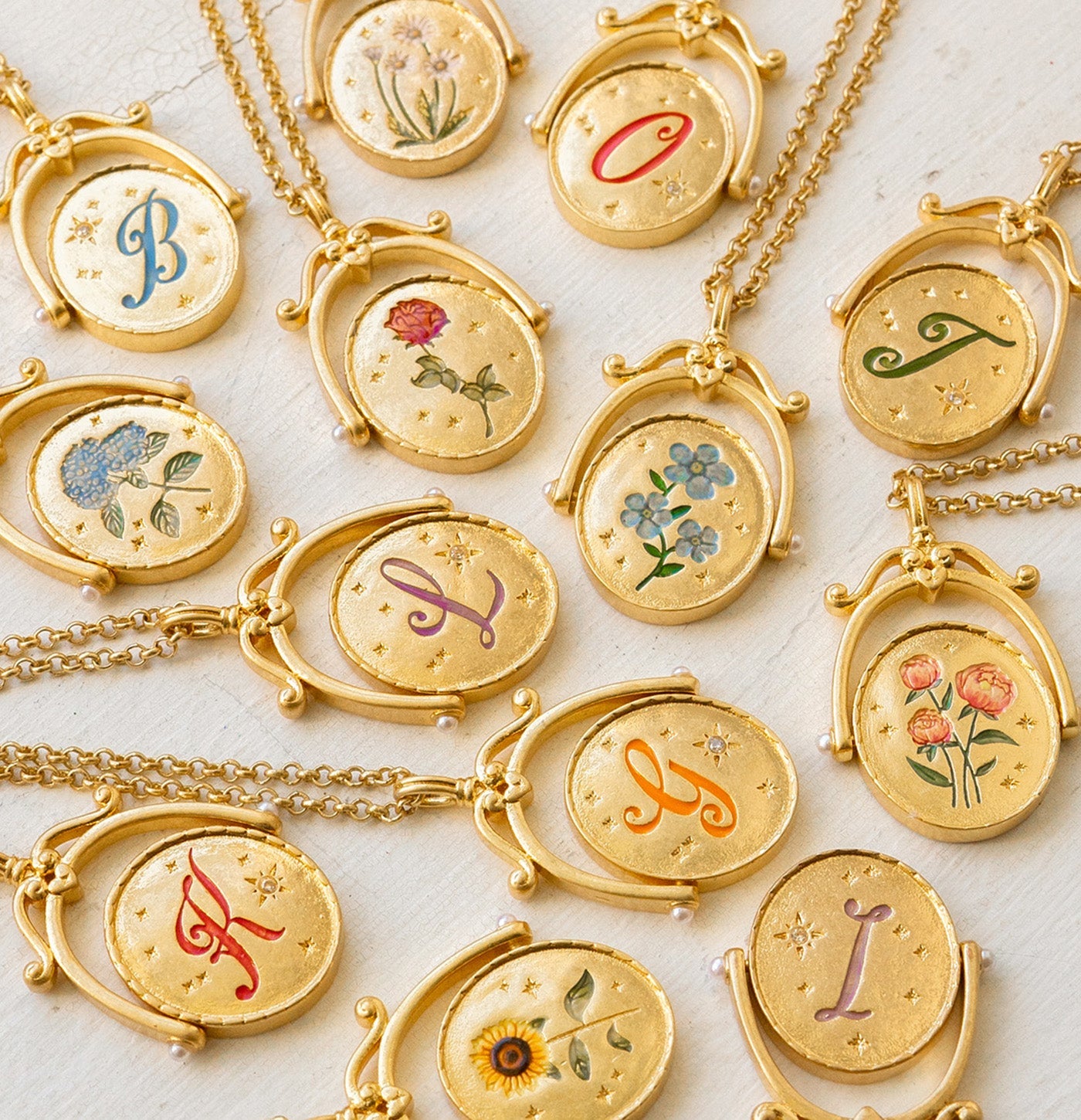 Gold Alphabet Spinner Halsketten | Fable England